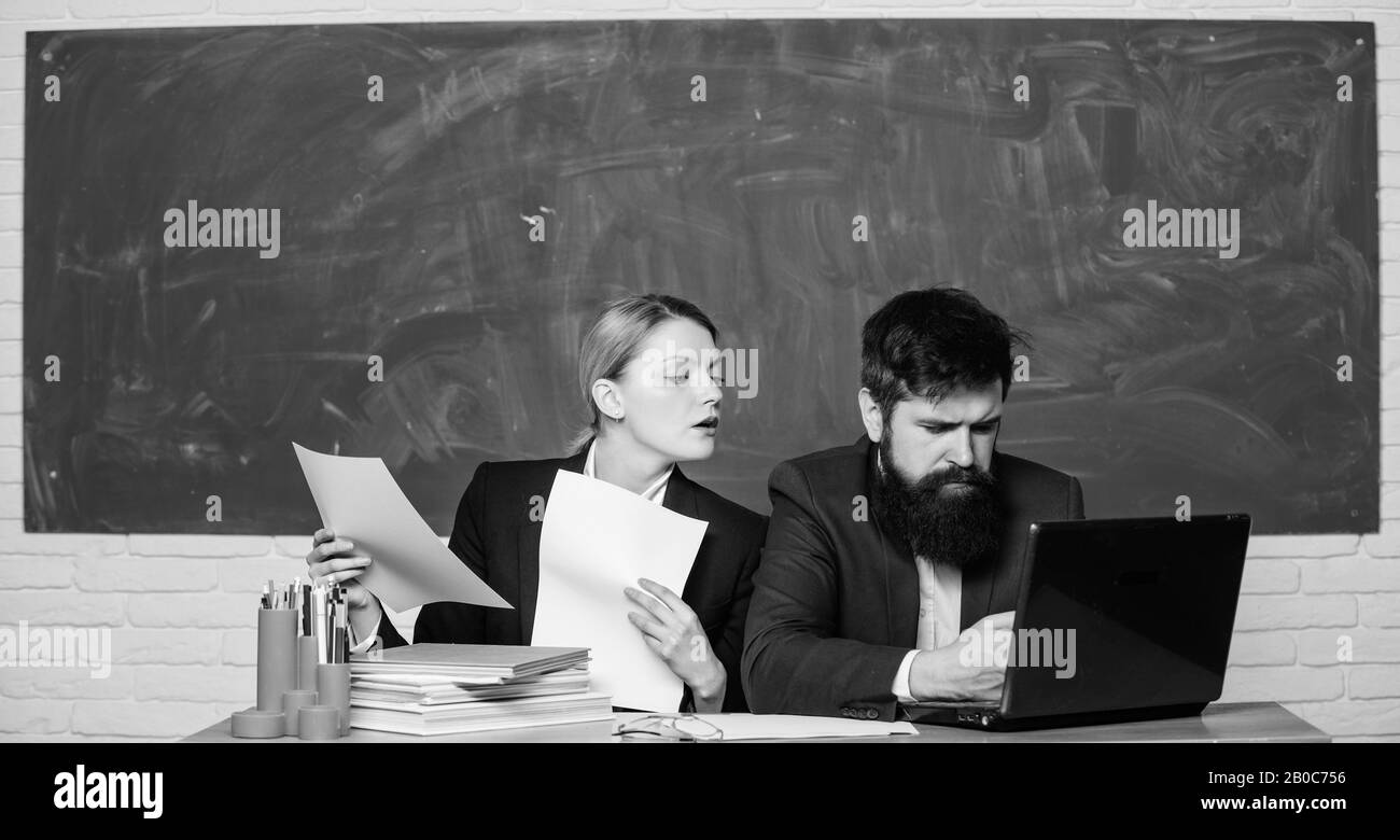 Annual report. Teacher and supervisor working together in school ...