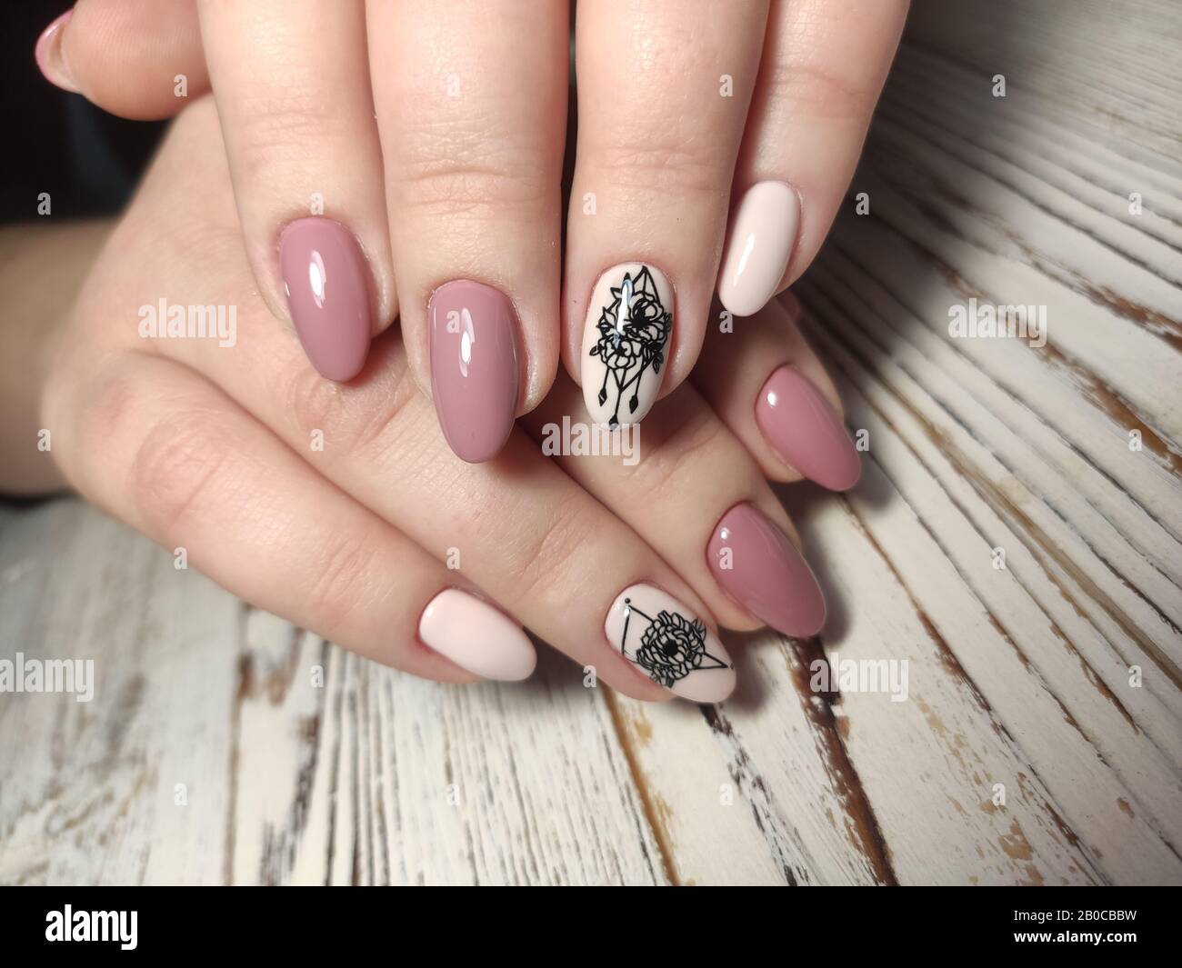 stylish manicure with a design Stock Photo - Alamy