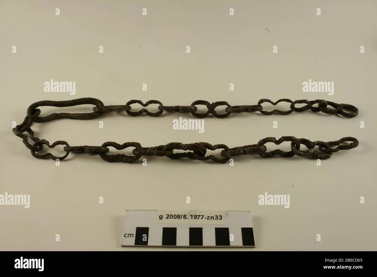 Chain of iron, consisting of 21 8-shaped links, of which the 9th is a ...