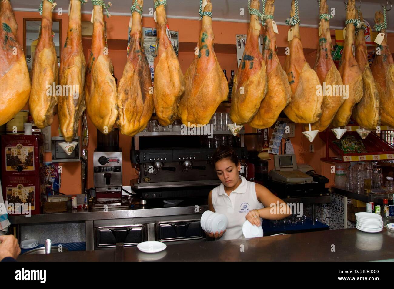Spanish ham hanging in bar hi-res stock photography and images - Alamy