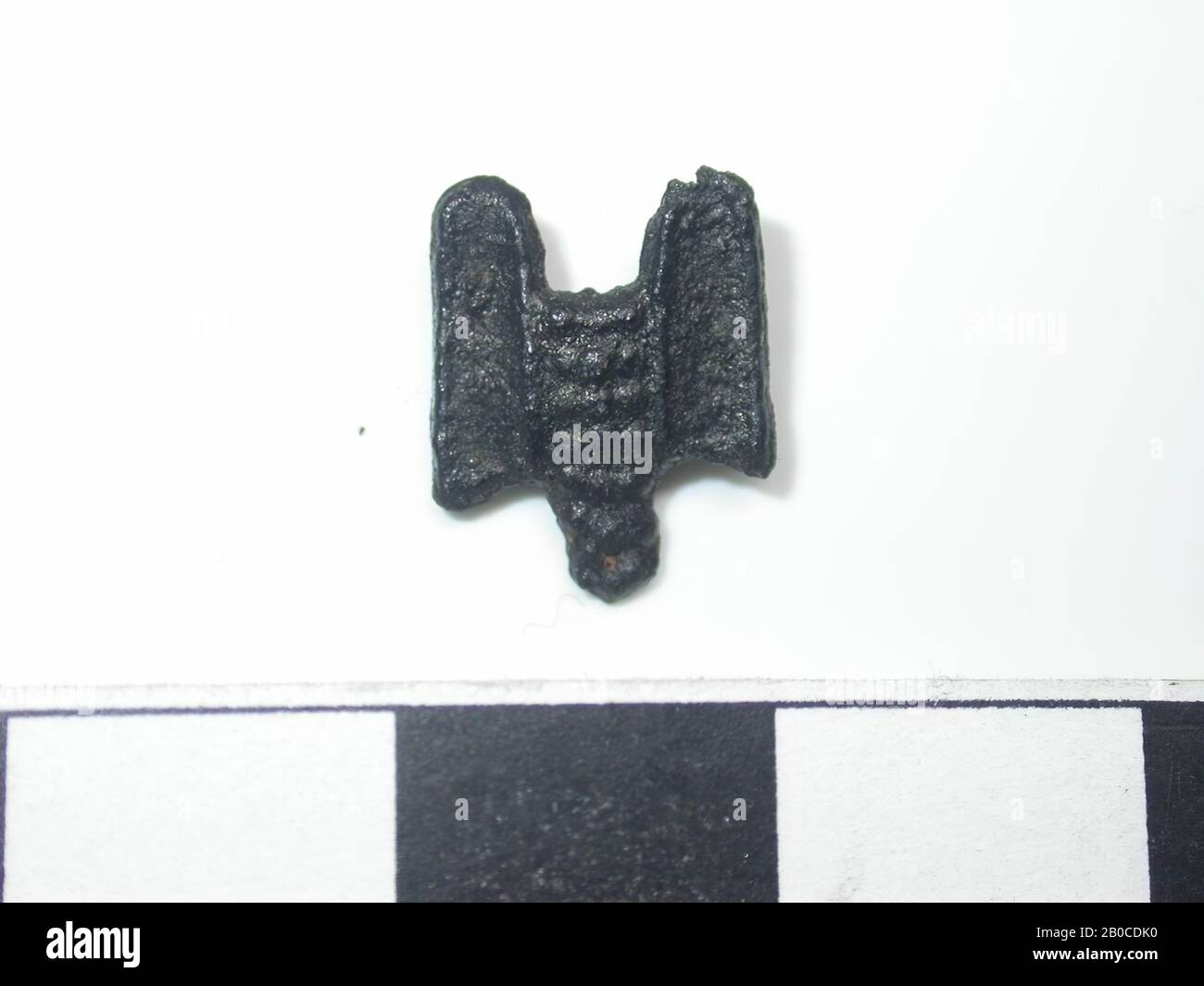 Figure of three elongated forms, black (lead Stock Photo - Alamy