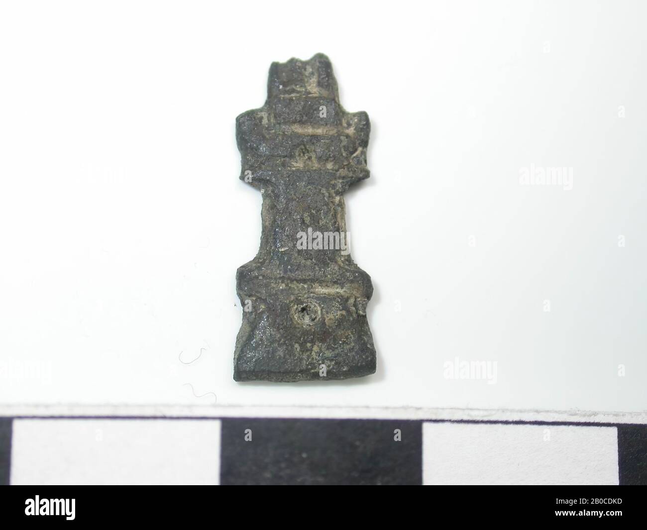 Tower, gold (copper alloy). Elongated tower, with narrow middle section ...