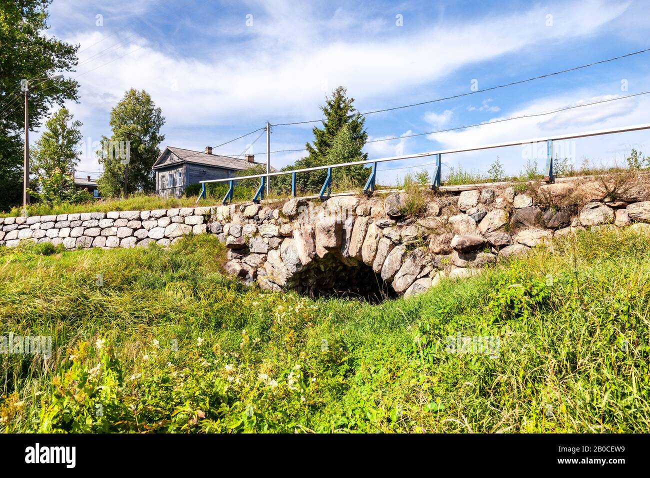 Ancient arch bridge from rough stones next the Borovichi, Russia Stock ...