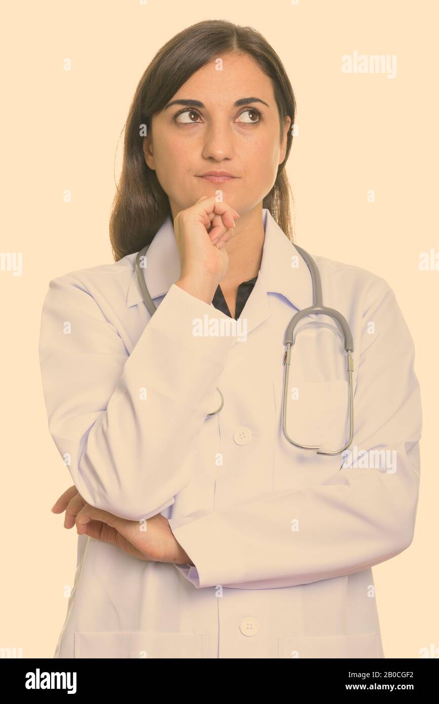 Close up of beautiful woman doctor thinking Stock Photo - Alamy