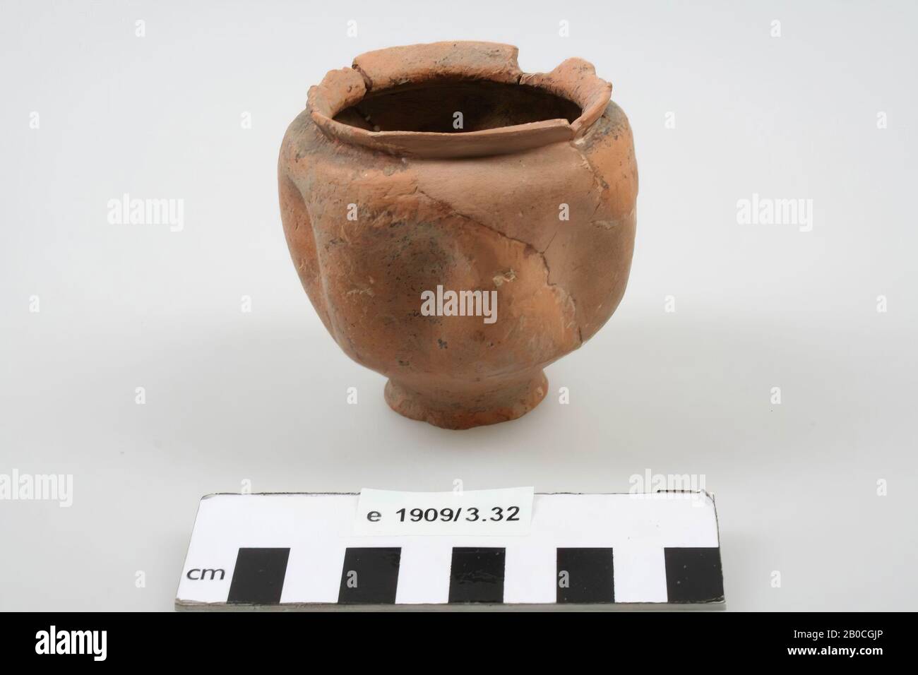 Pot with a squeezed wall of earthenware (dent). Old, unstable bonding ...