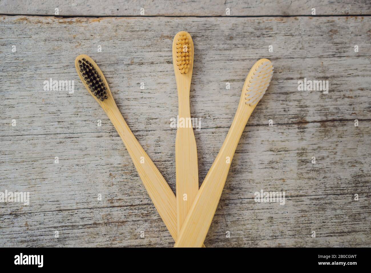 Zero waste concept. Bamboo toothbrush on wooden background. Plastic ...