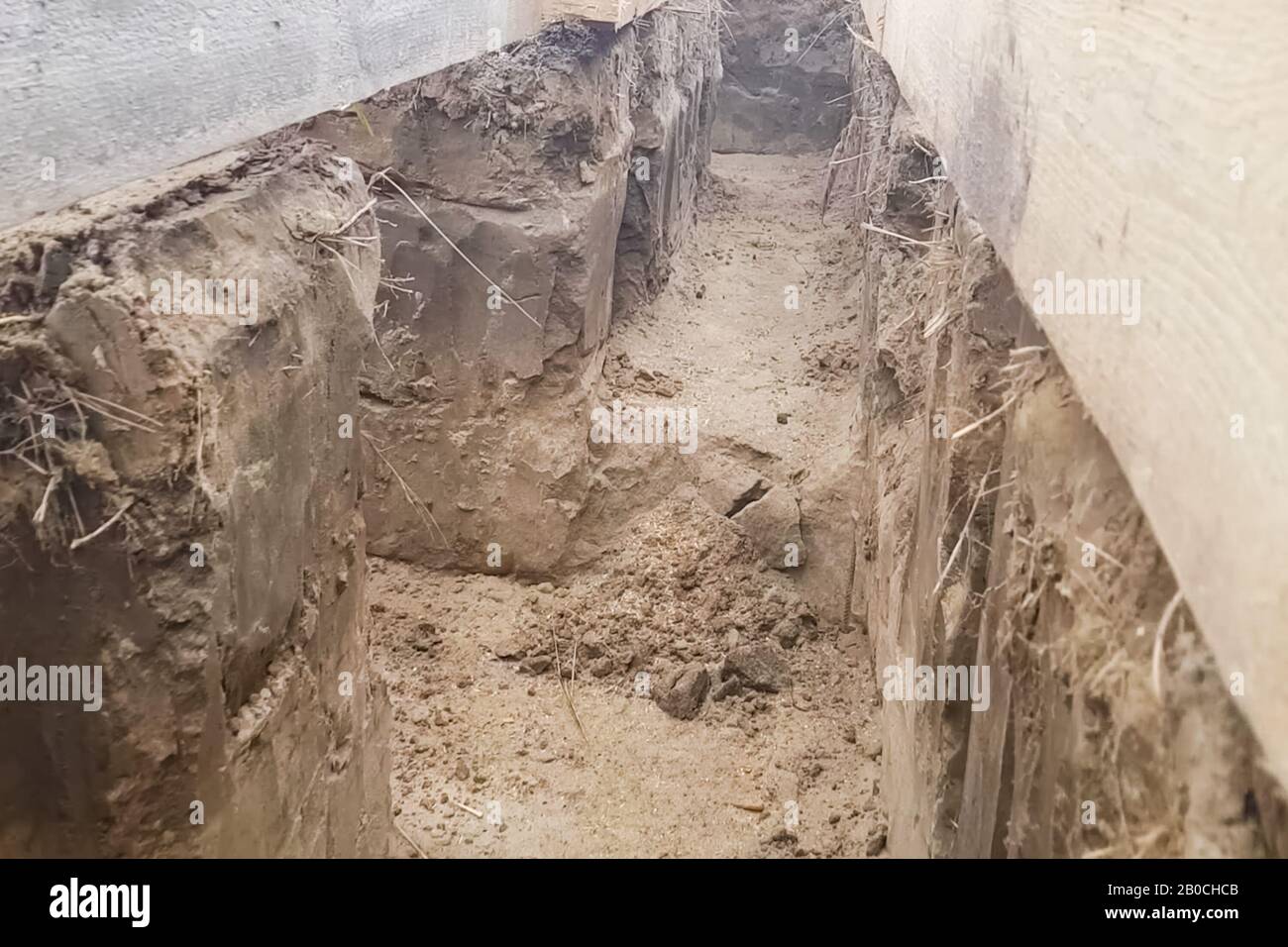 The foundation of the house. Building a house, digging the foundation ...