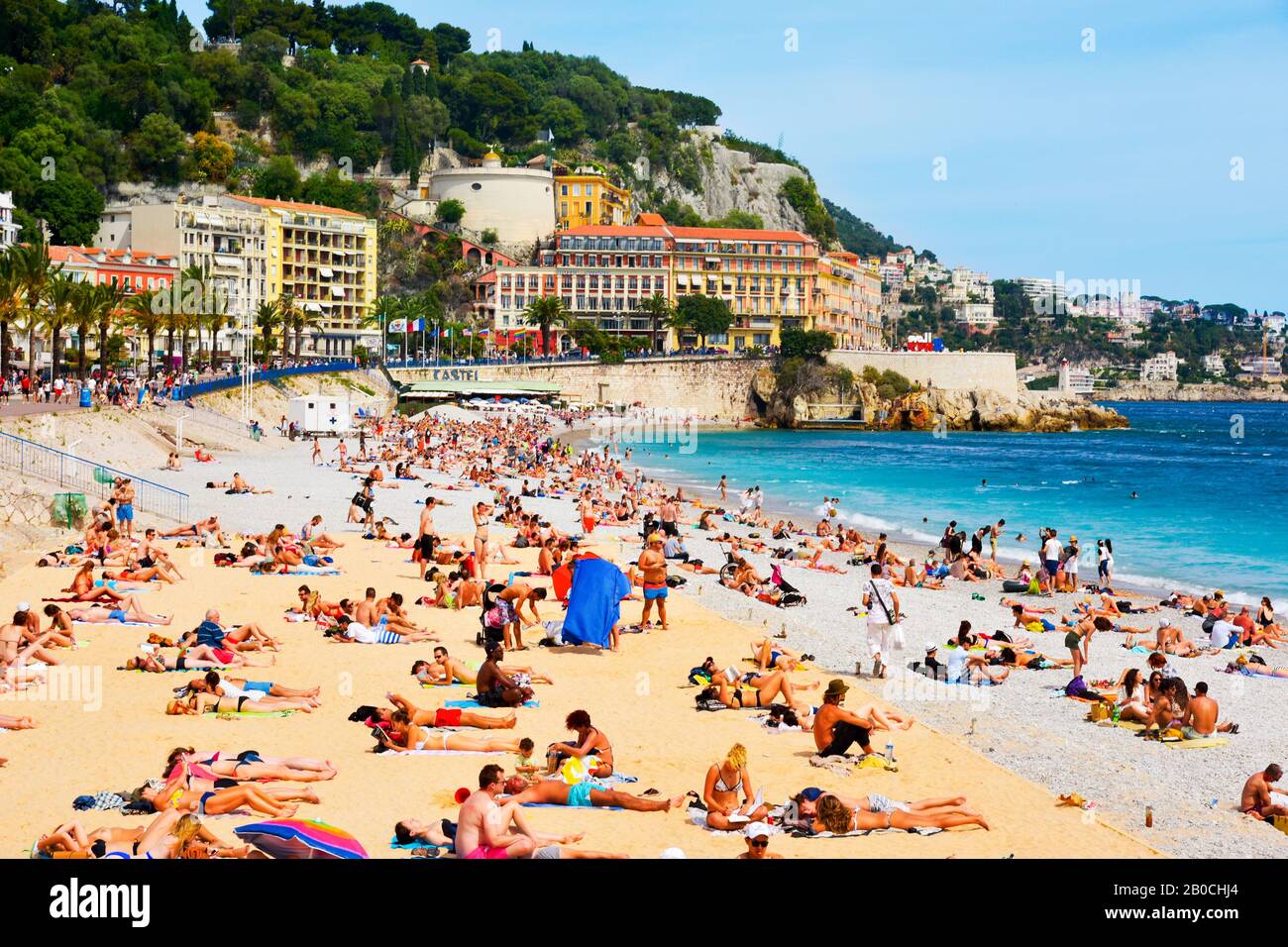NICE, FRANCE - JUNE 4, 2017: People sunbathing on the beach in Nice, in ...