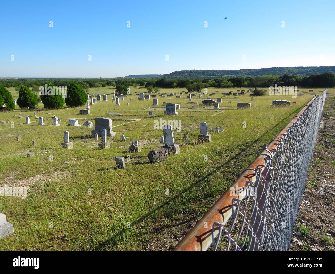 Tree over cemetery hi-res stock photography and images - Alamy