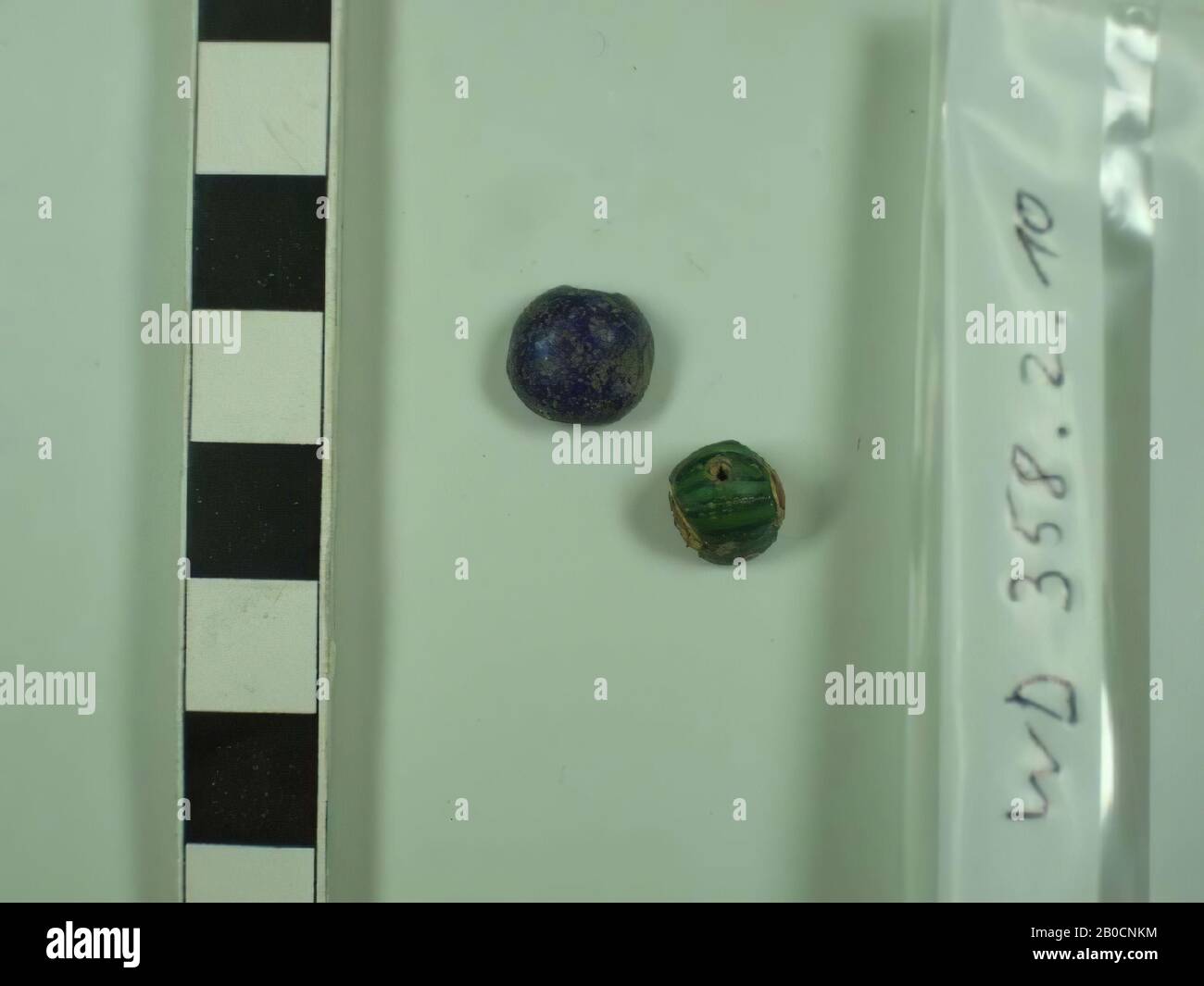 fragments of beads, one hemispherical bead, monochrome opaque blue, one ...