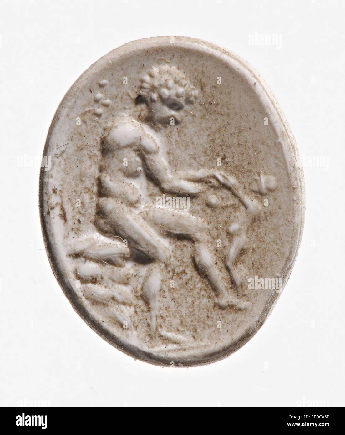 Vz: the satyr sits on a pile of stones behind which a tree is visible ...