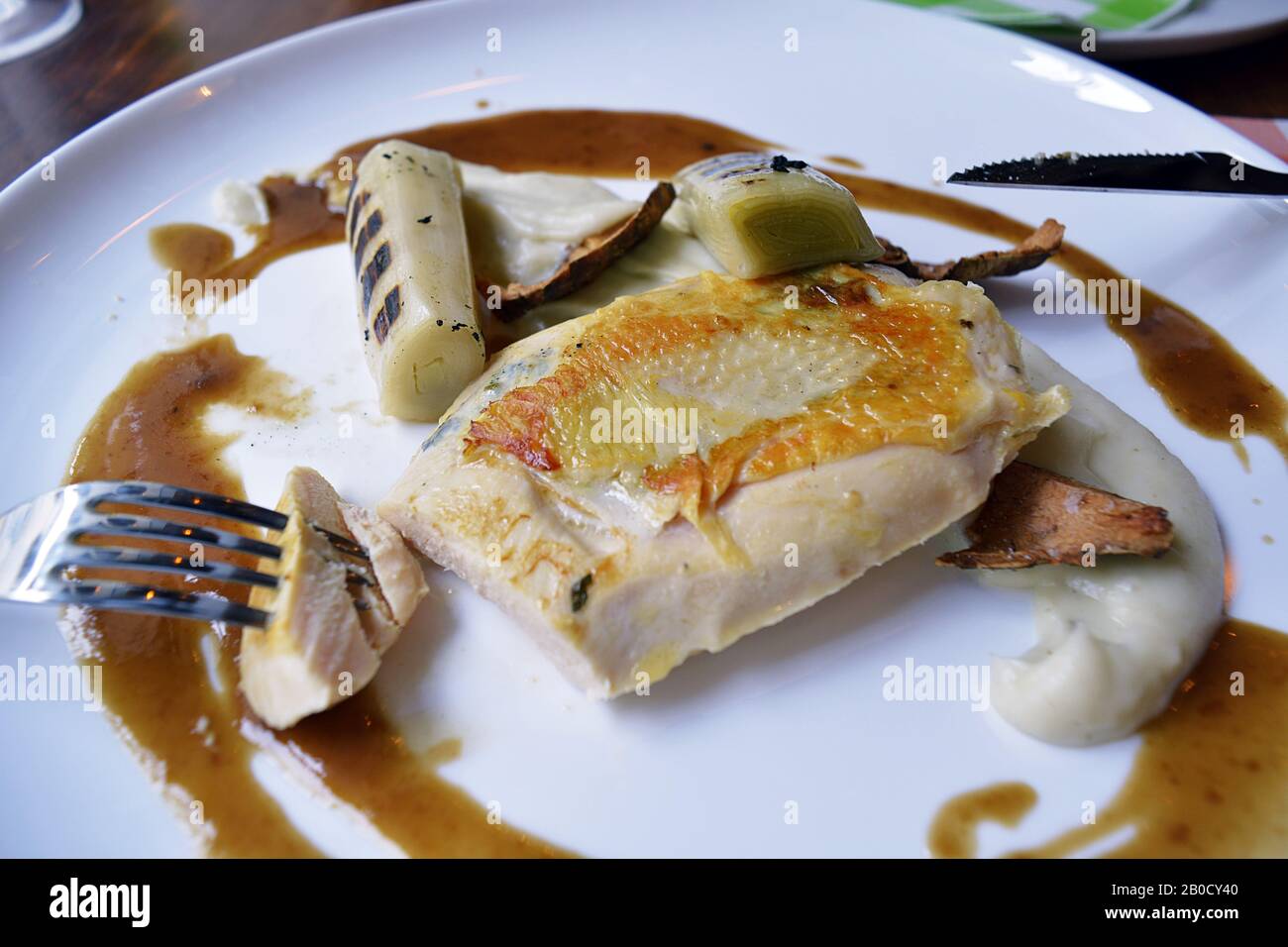 Lunch in a restaurant. Chicken with a dressing Stock Photo - Alamy