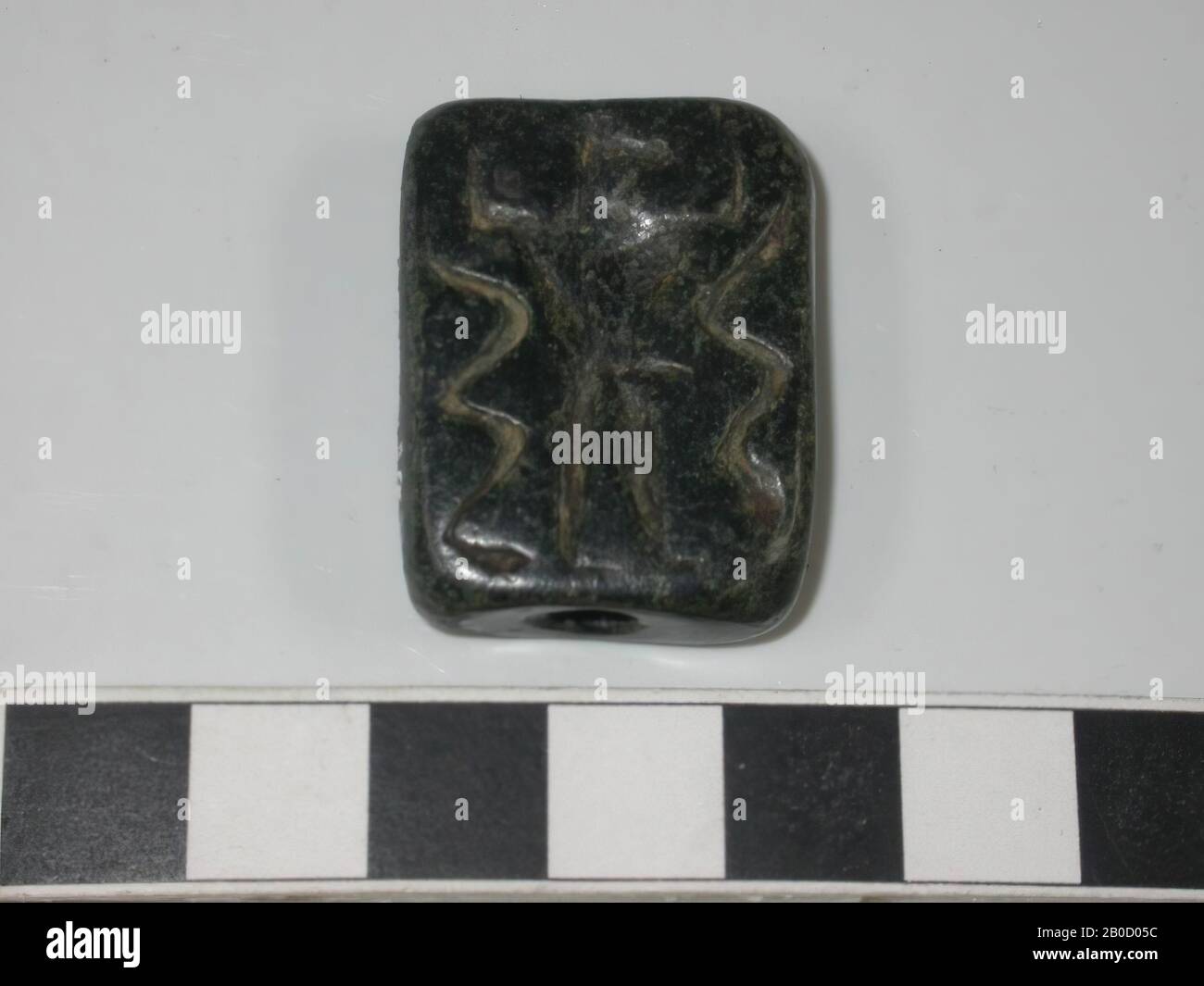The amulet is rectangular in shape and polished in its entirety. Images ...