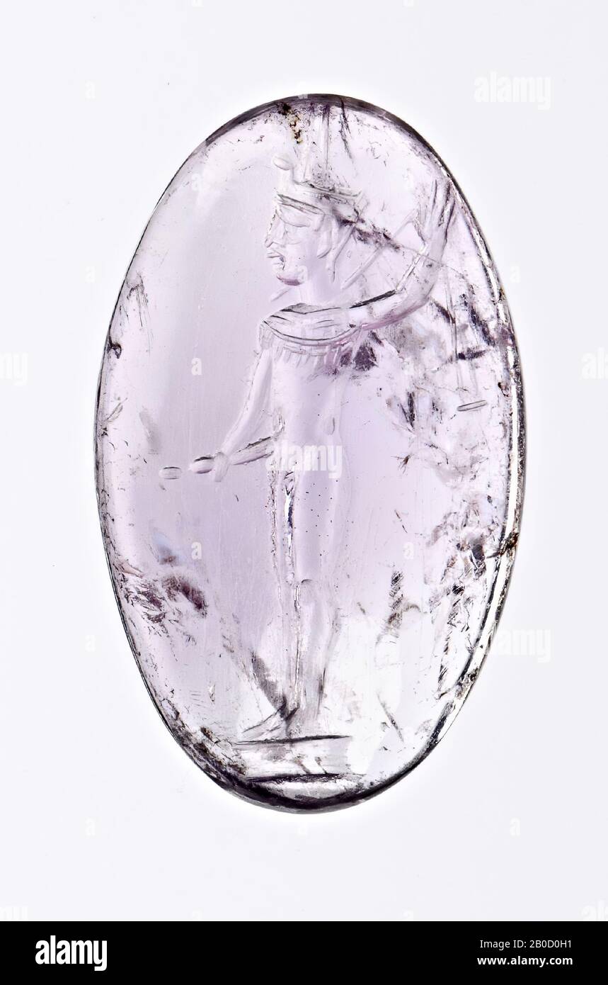 Vz: standing figure to the right, raised right arm, Egyptian headdress ...