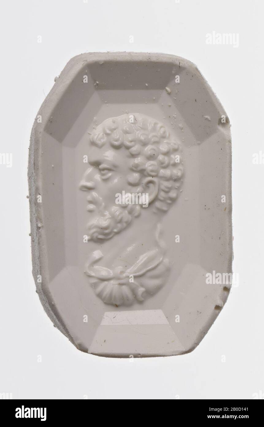 F: head of a man with curly hair and beard and profile to the right ...