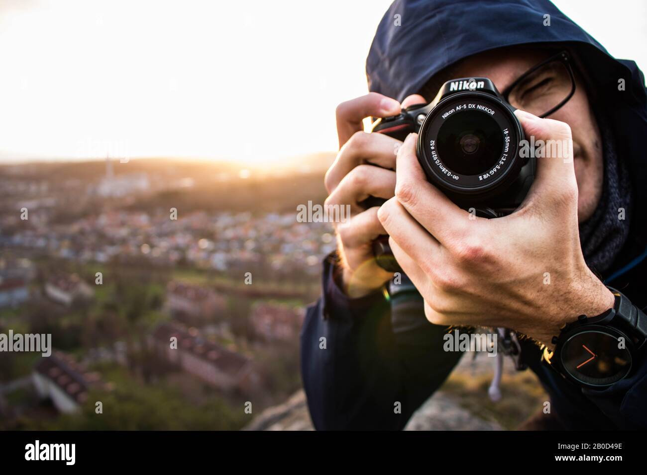 Photographer in action Stock Photo - Alamy