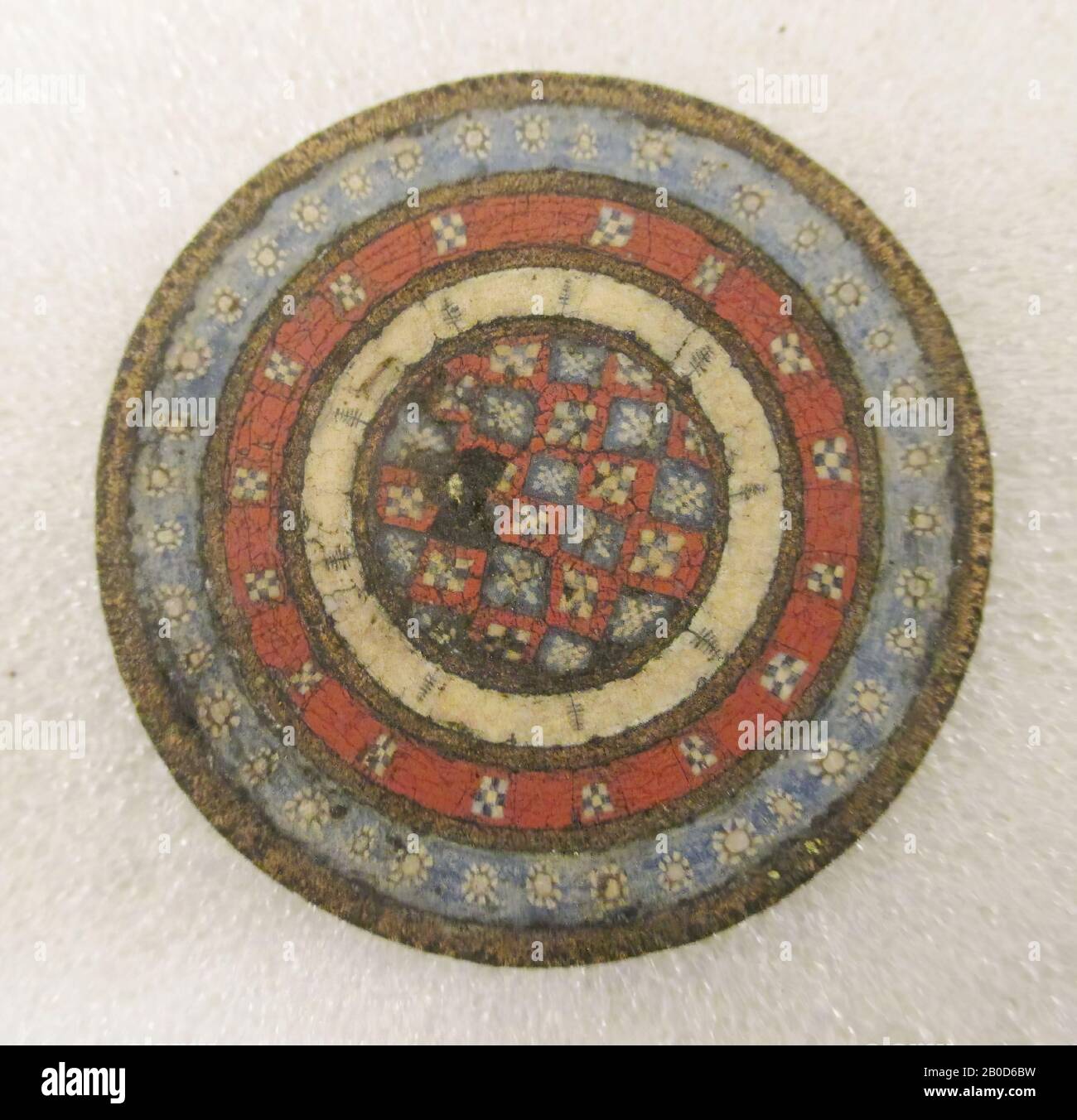 Roman round disc fibula. The fibula is decorated at the front with 8 ...