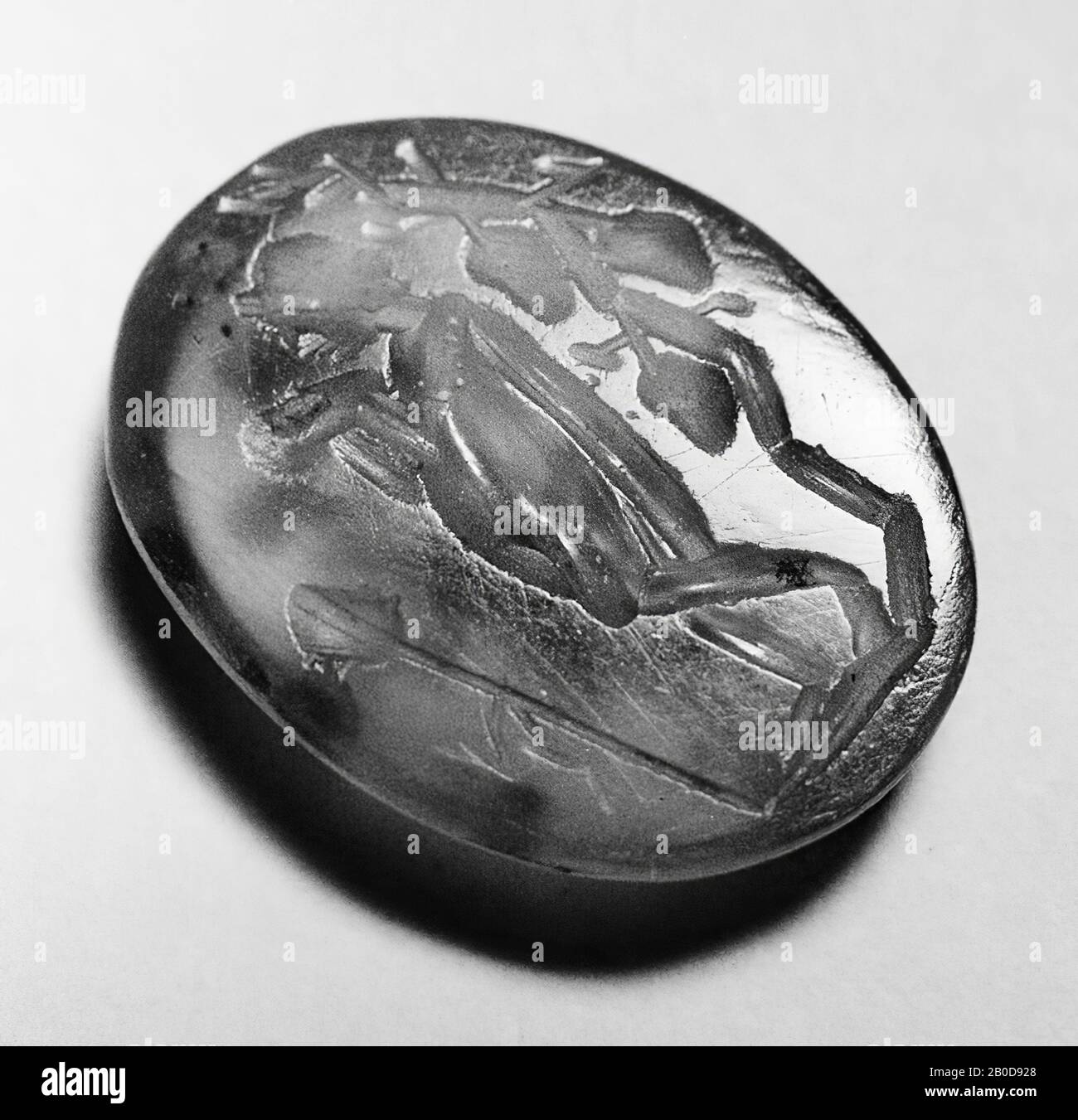 young satyr with drinking bowl in front of his face. Behind him a tree ...