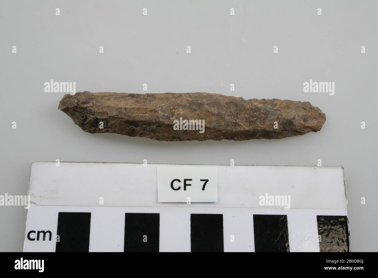 Piece of curved flint, tool, stone, flint, 1 x 1.6 x 9 cm, prehistoric ...