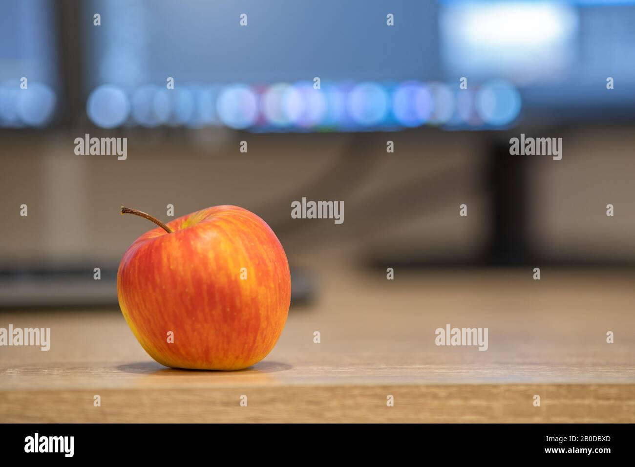 Red apple on office desk hi-res stock photography and images - Alamy