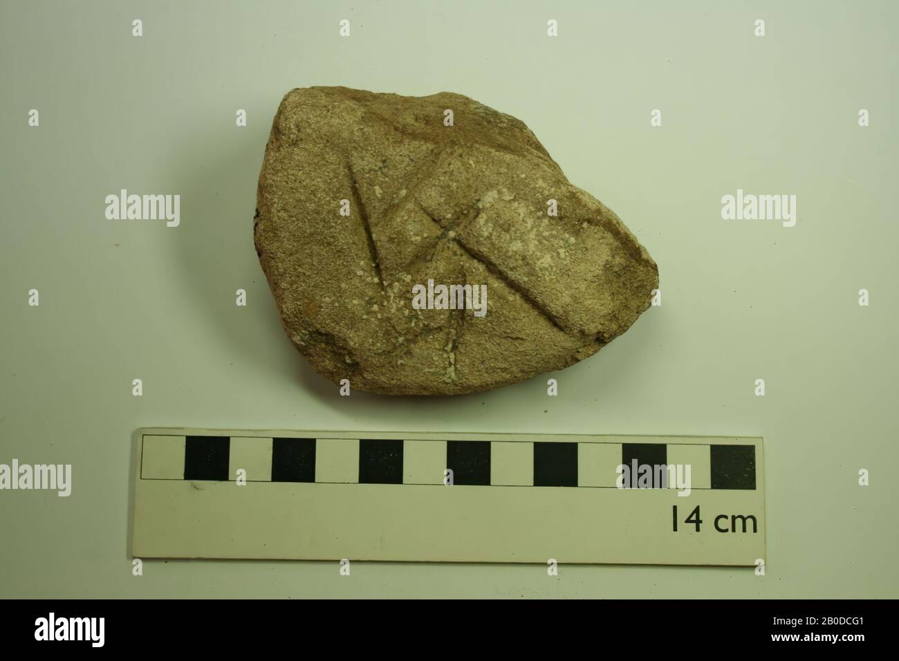 fragment, triangle, line pattern, sandstone fragm. with engraved ...
