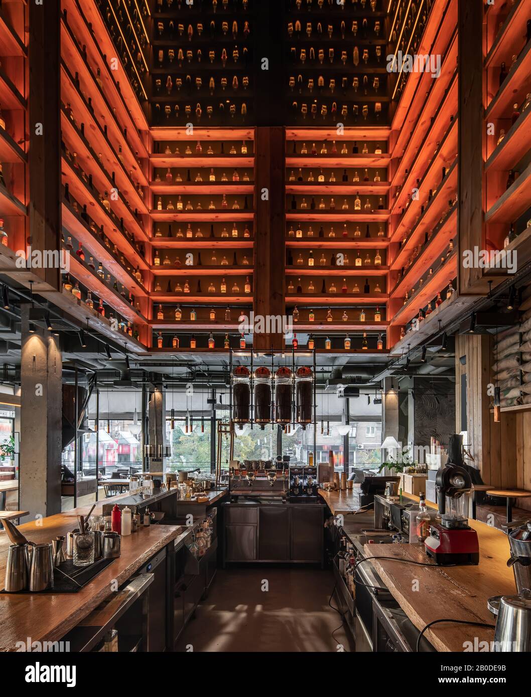 Great coffee house in a loft style with concrete columns. There many ...