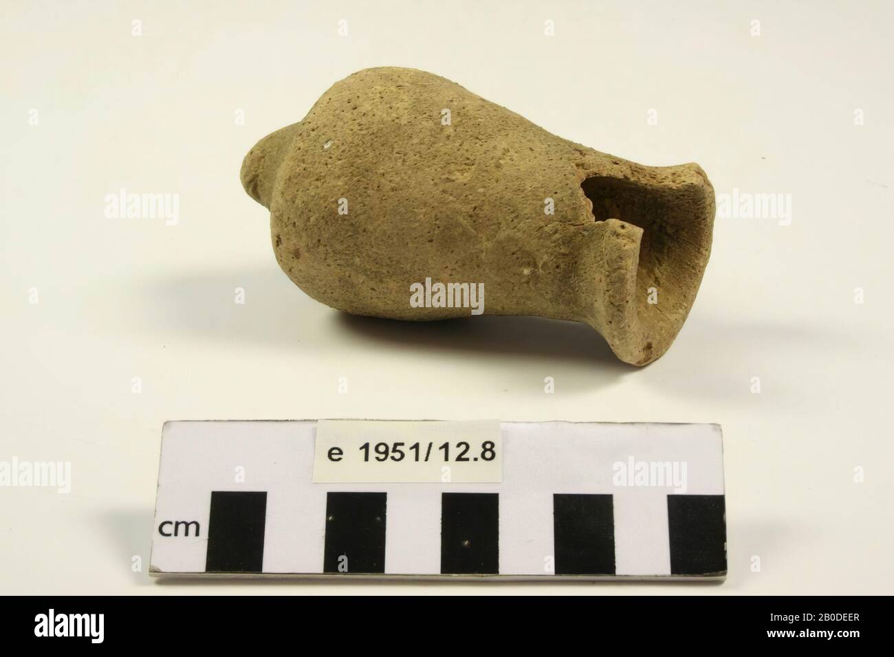 Balsamarium on narrow foot of rough-walled earthenware. Part of the ...