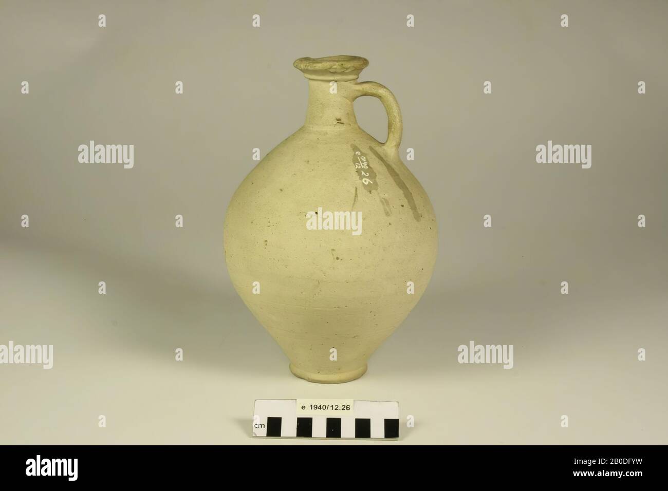 Roman jug of white pipe earth. Chips of mouth and foot, 2 gray spots on ...