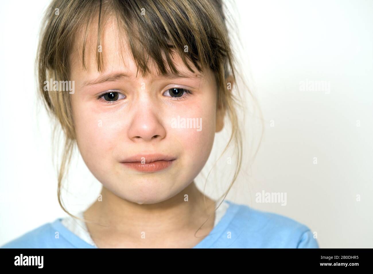 Closeup portrait of sad crying child girl Stock Photo - Alamy