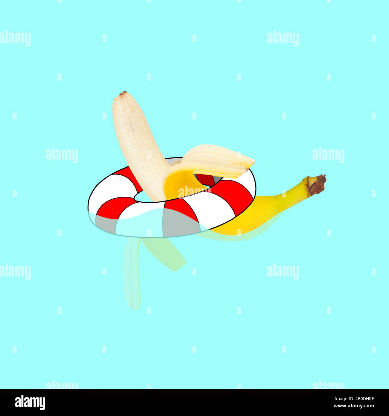 Banana swimming in swimring on blue water pool background. Copyspace ...