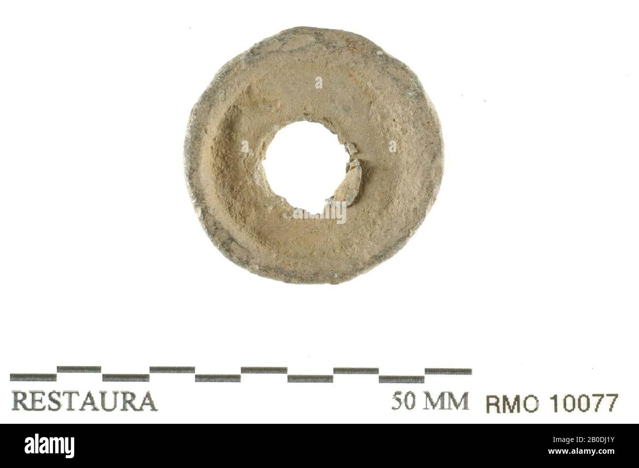 disc, round hole in the middle, raised edge, disc, round hole in the ...