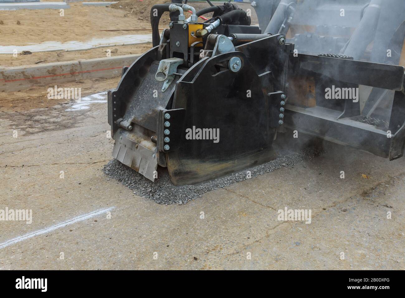 Machine cutting technique remove old asphalt from the road Stock Photo ...
