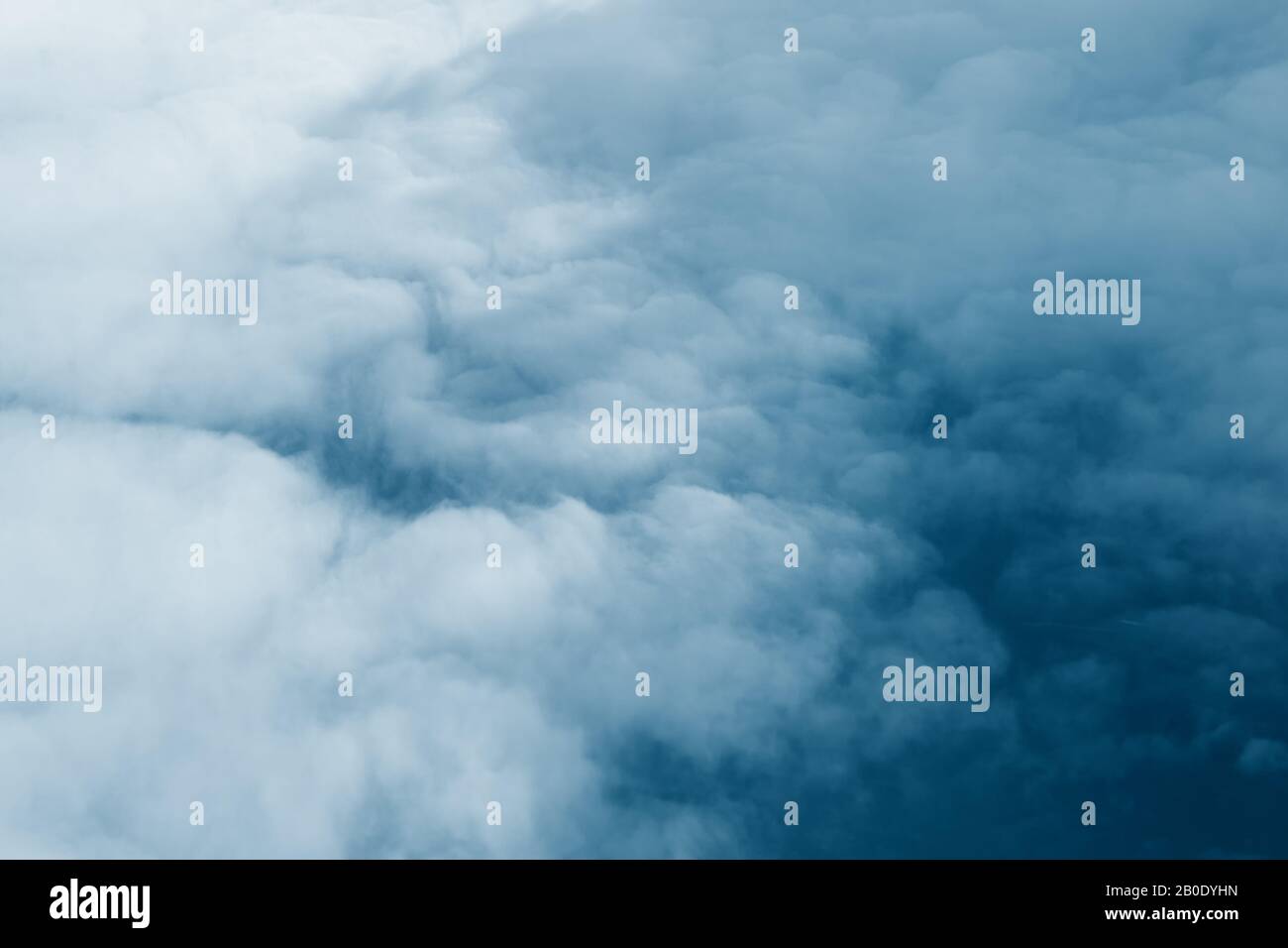 Aerial flight through dense clouds hi-res stock photography and images ...