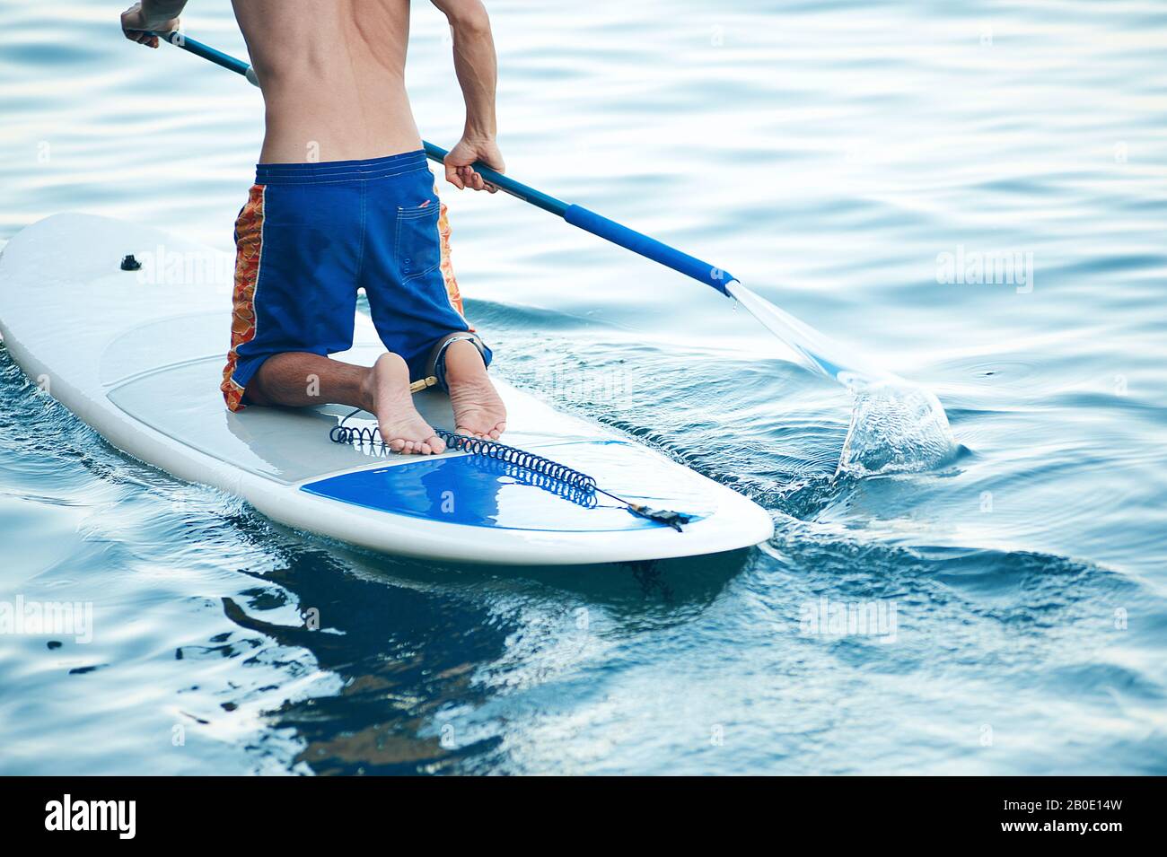 Man stand up paddling in the ocean hi-res stock photography and images ...