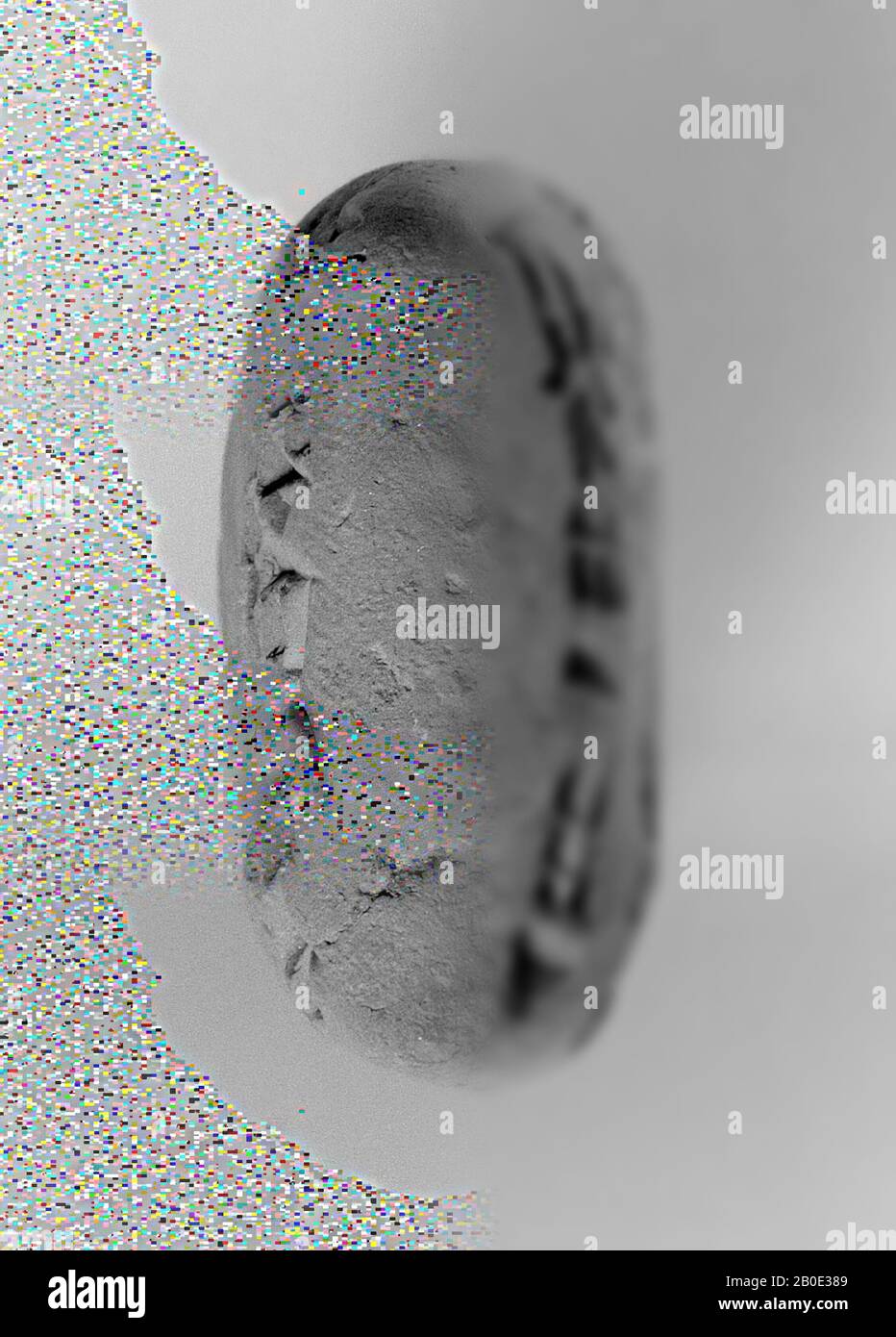 A clay tablet with a cuneiform inscription. The text is an ...