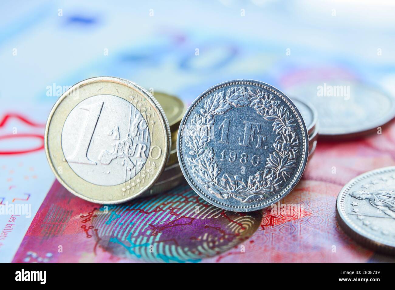 euro and swiss francs coins an banknotes Stock Photo - Alamy