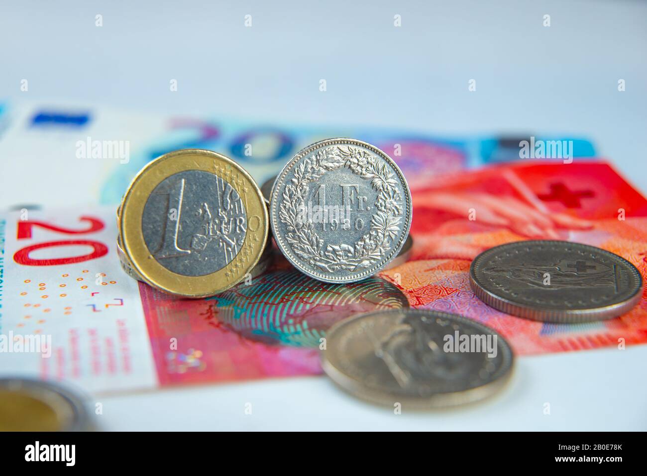 euro and swiss francs coins an banknotes Stock Photo - Alamy
