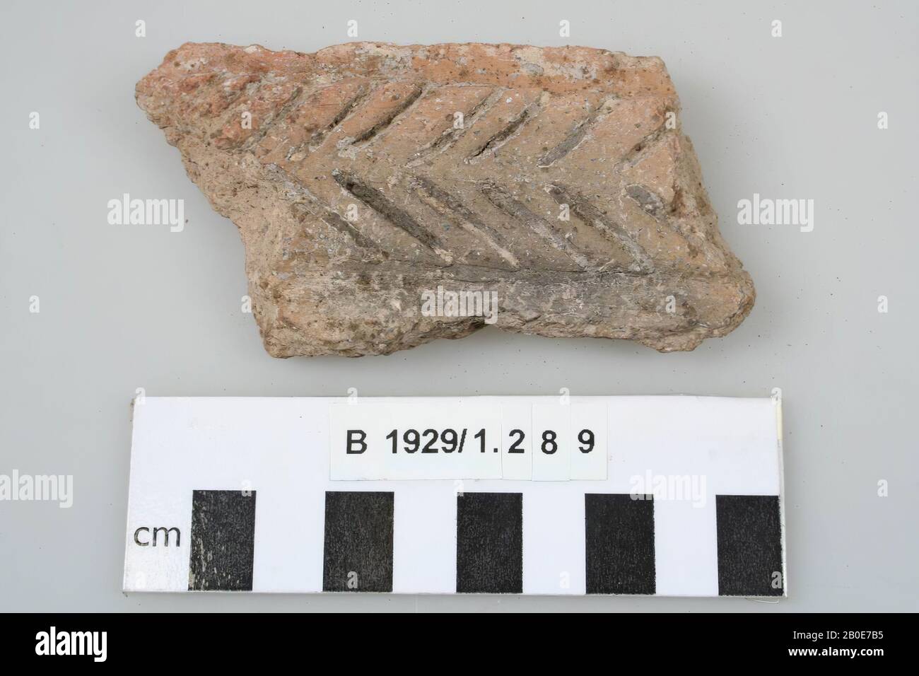 A wall shard with an incised herringbone pattern, crockery, earthenware ...