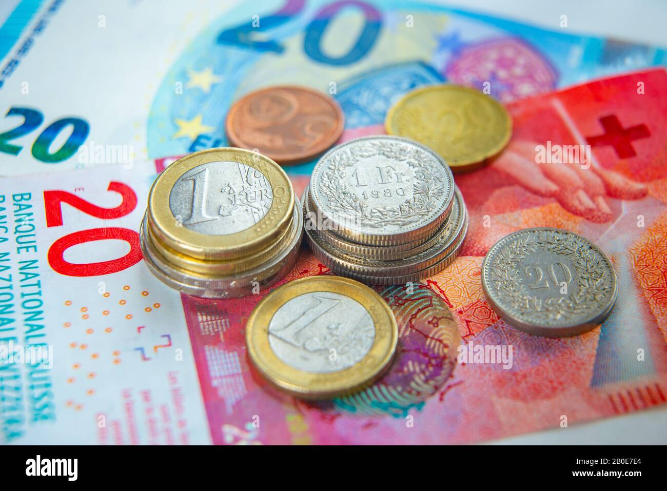euro and swiss francs coins an banknotes Stock Photo - Alamy