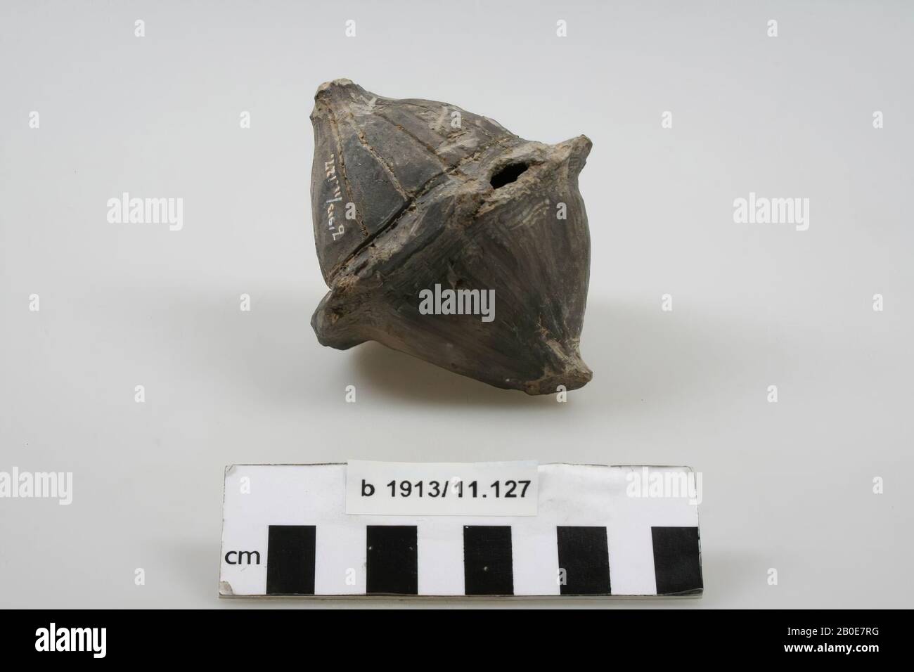 Double-conical rattle of hand-formed earthenware (terpaware) with ...