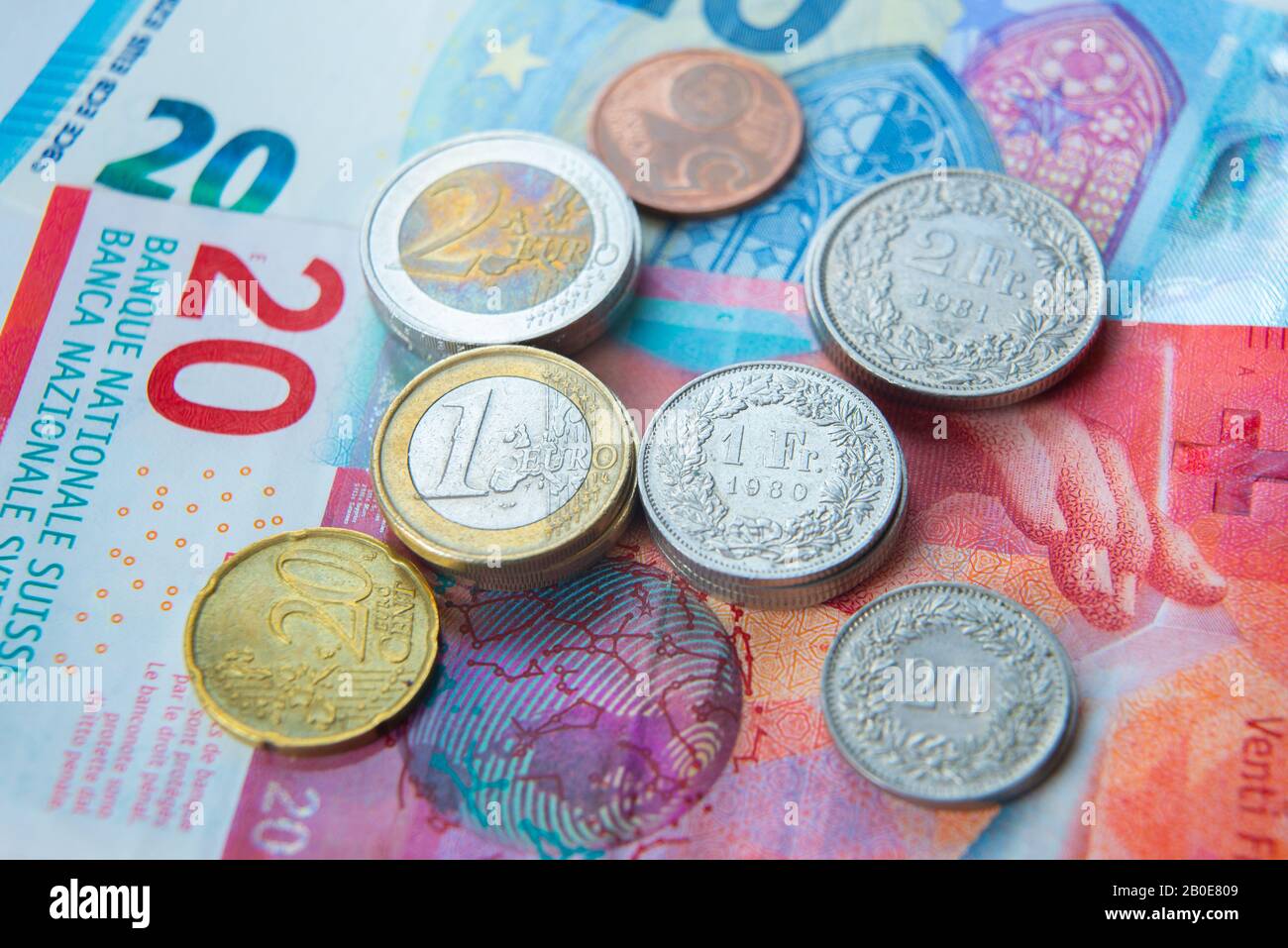 euro and swiss francs coins an banknotes Stock Photo - Alamy