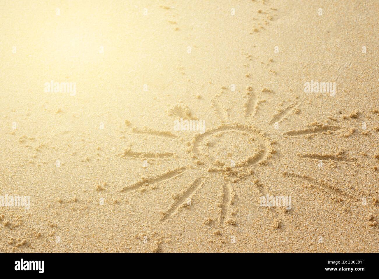 Drawing of sun on the sand. Concept of any beach vacation theme Stock ...