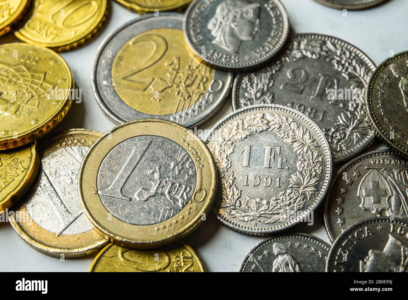 euro and swiss francs coins an banknotes Stock Photo - Alamy