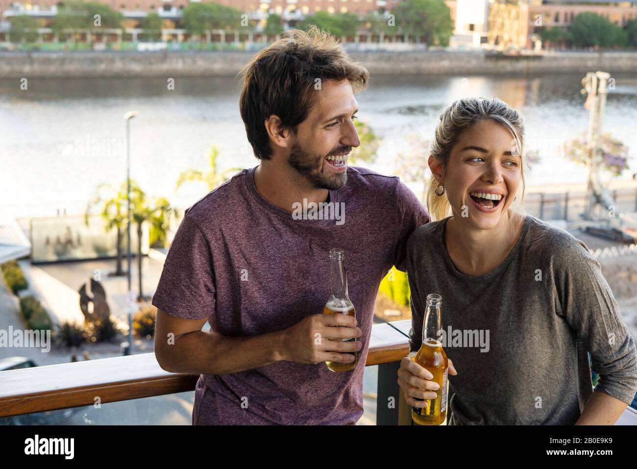 Man with top standing on balcony hi-res stock photography and images ...
