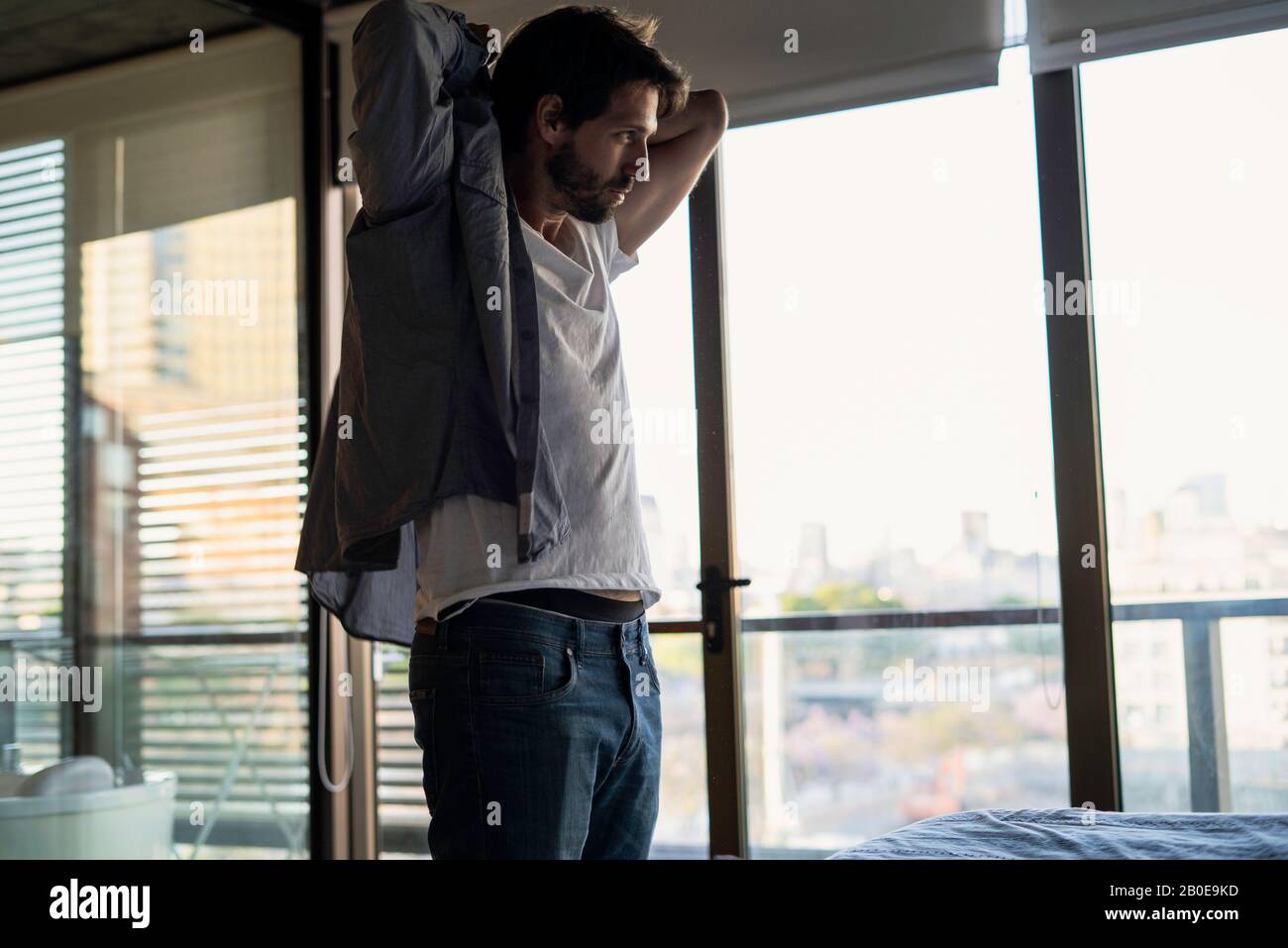 Man getting dressed hi-res stock photography and images - Alamy