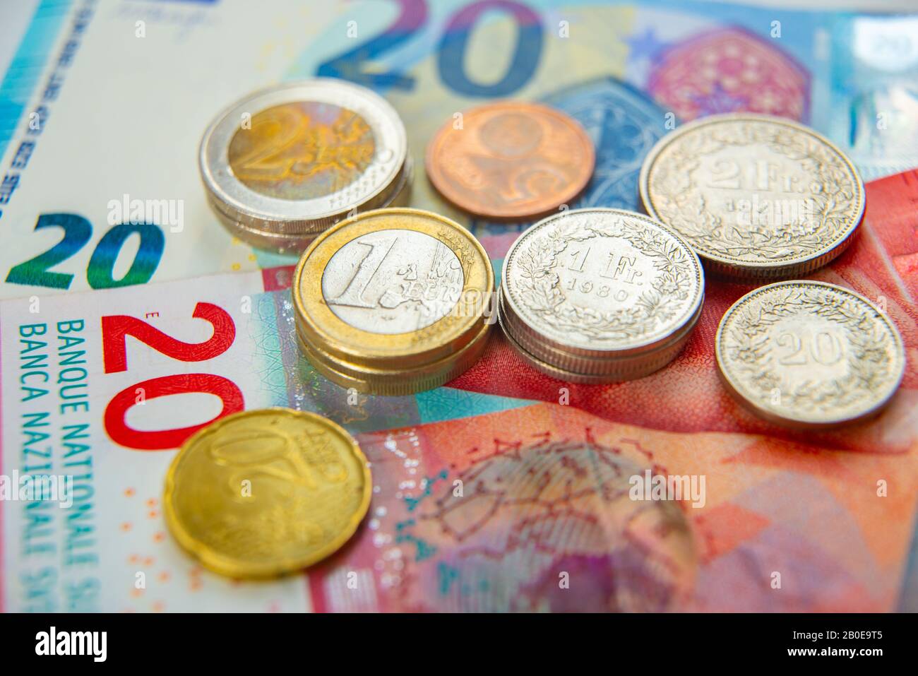 euro and swiss francs coins an banknotes Stock Photo - Alamy