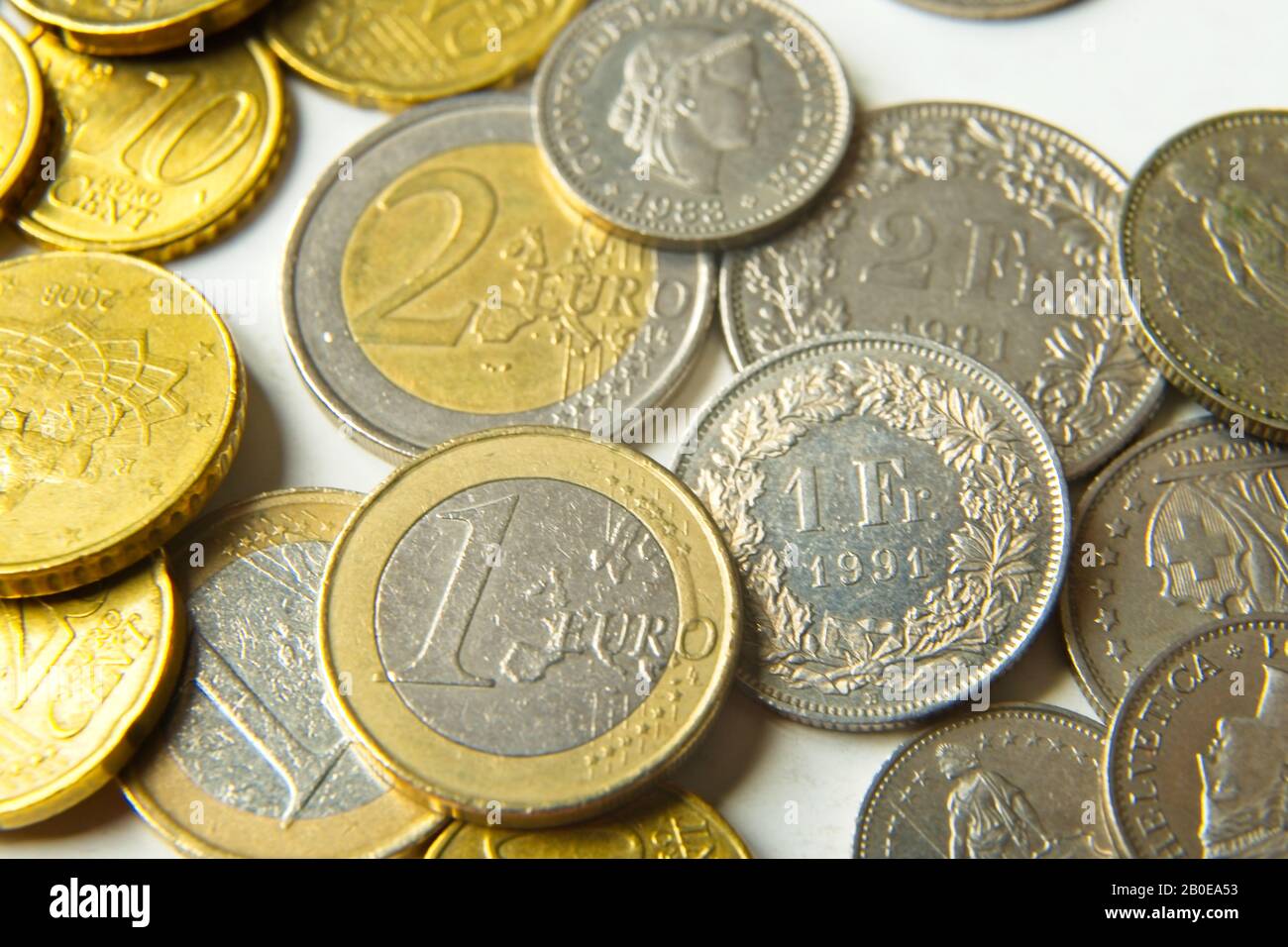 euro and swiss francs coins an banknotes Stock Photo - Alamy