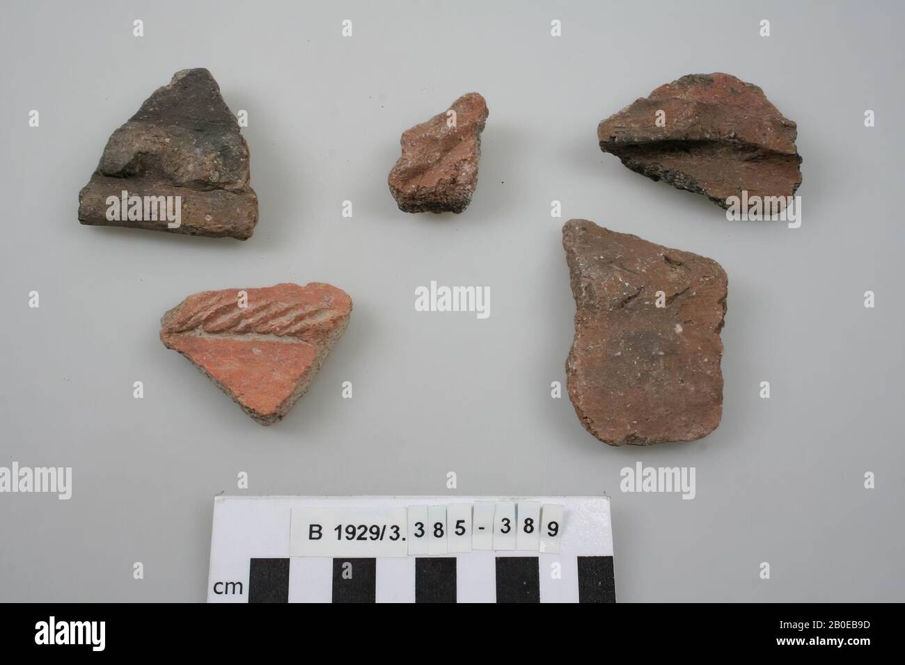 A wall shard, decorated with a roll of clay and notches., Crockery ...