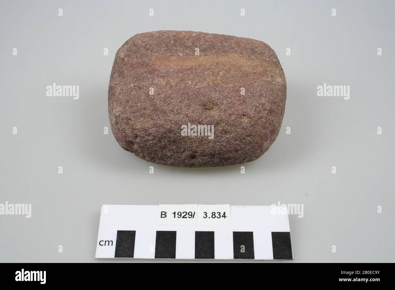 An oblong shaped rubble, made of sandstone, grindstone, stone ...