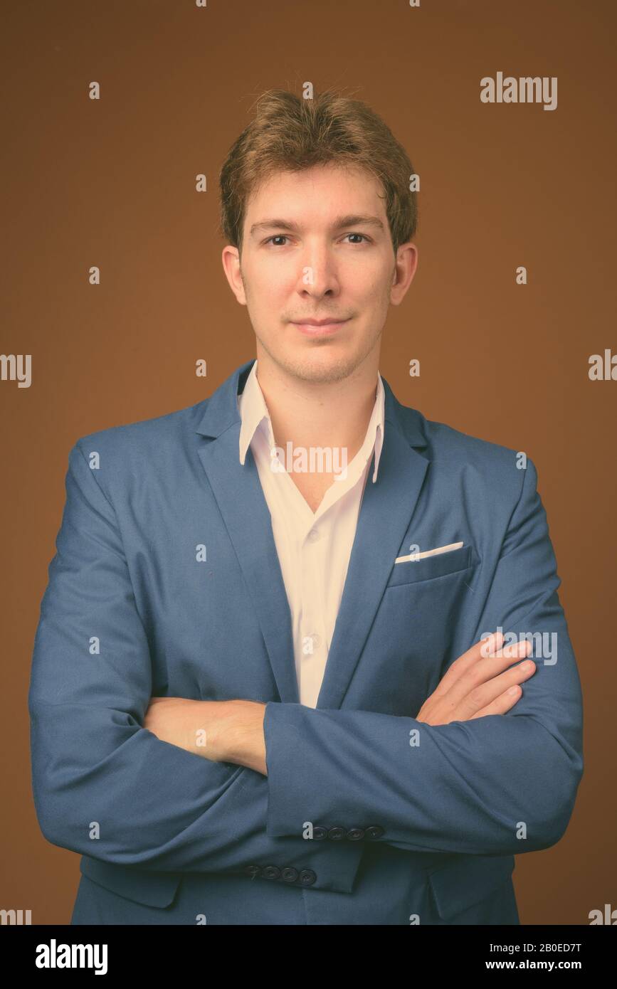 Wearing blue business suit hi-res stock photography and images - Alamy
